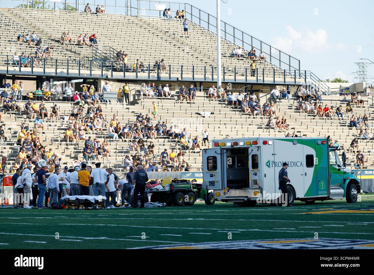 Ambulance comes on the field to take Toledo quarterback John Alan ...