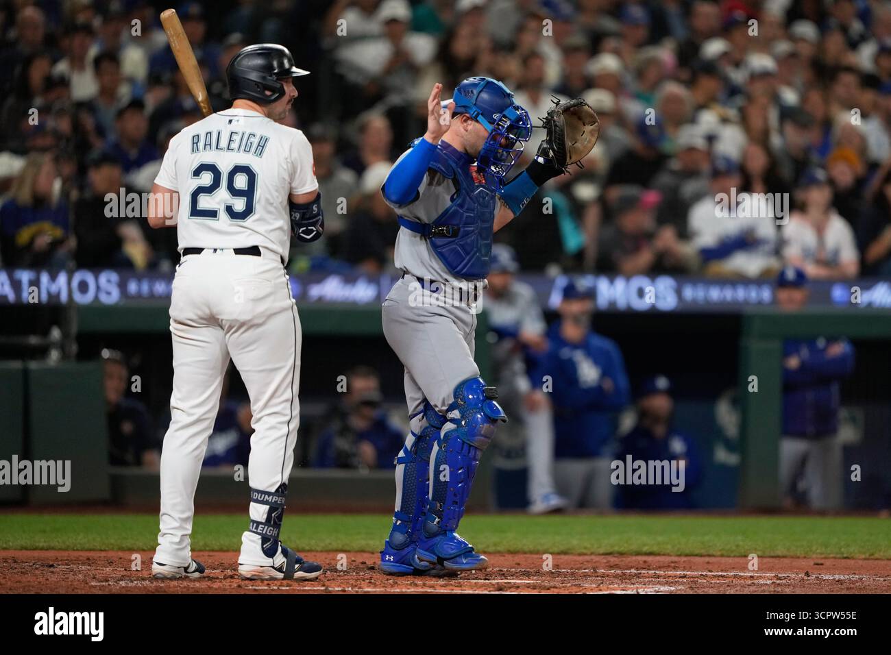 Los Angeles Dodgers catcher Dalton Rushing, right, calls for a mound ...