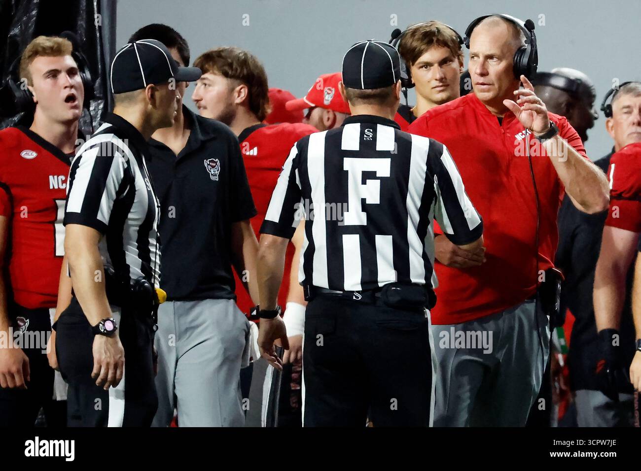 North Carolina State head coach Dave Doeren speaks with officials ...