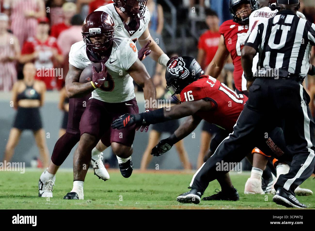Virginia Tech running back Terion Stewart (8) breaks the tackle of ...