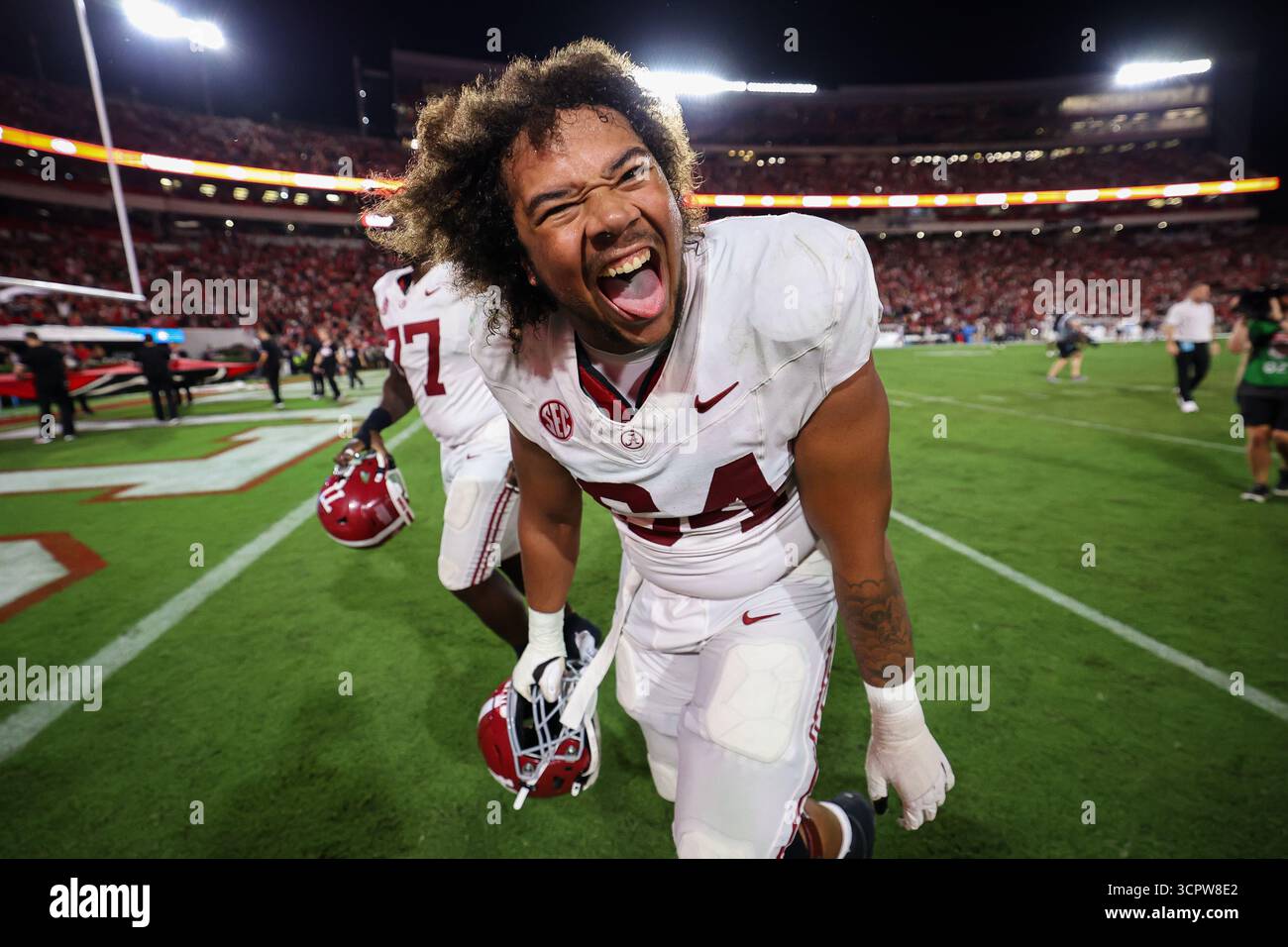 Alabama offensive lineman Michael Carroll (64) reacts after an NCAA college football game ...