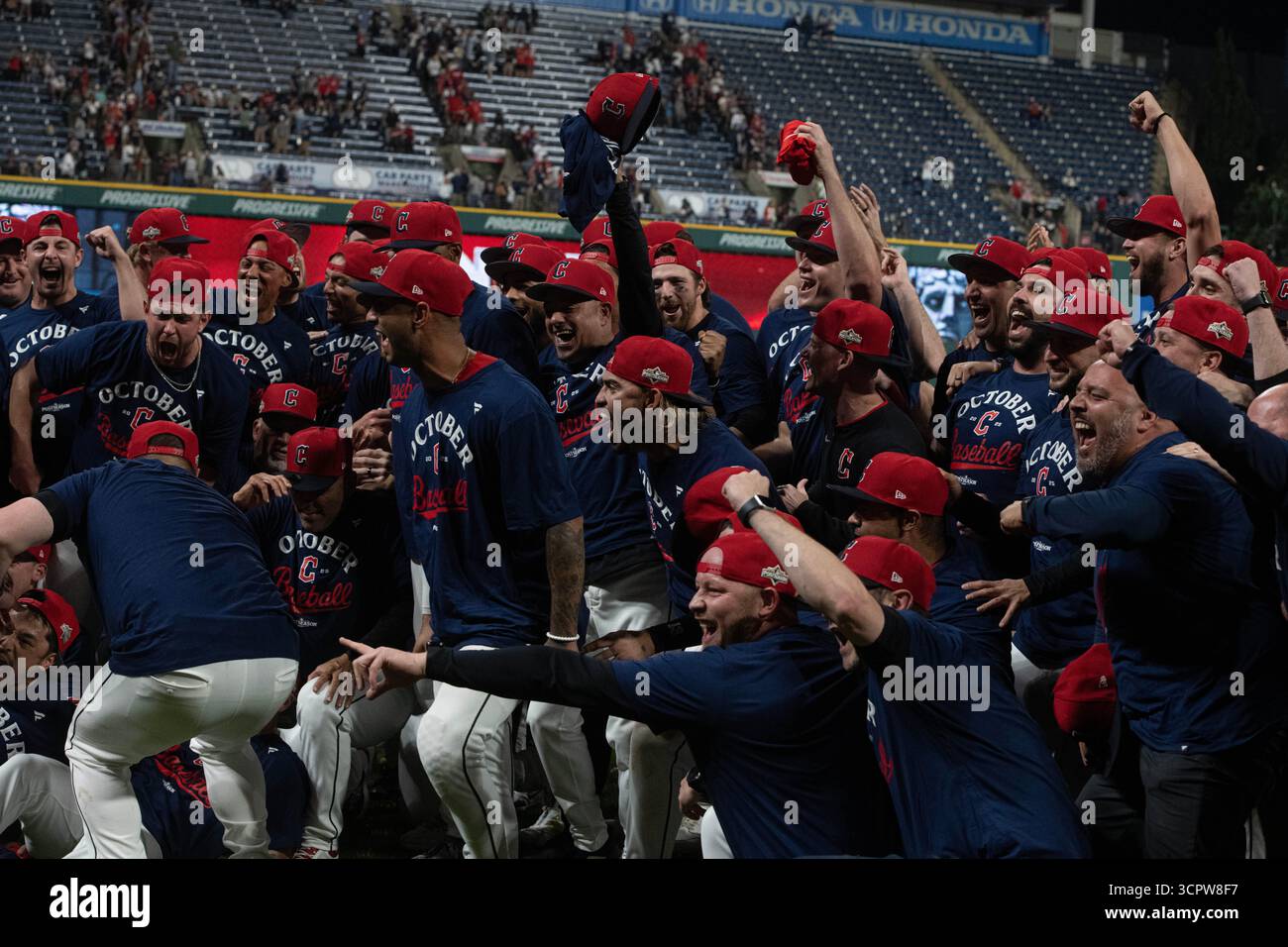 The Cleveland Guardians celebrate securing an American League playoff ...