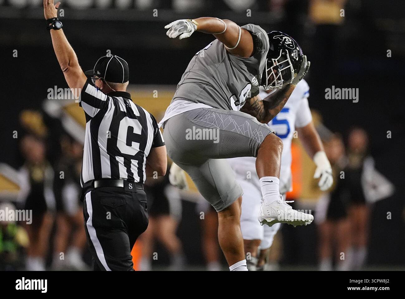 Colorado defensive tackle Tavian Coleman celebrates after tackling ...