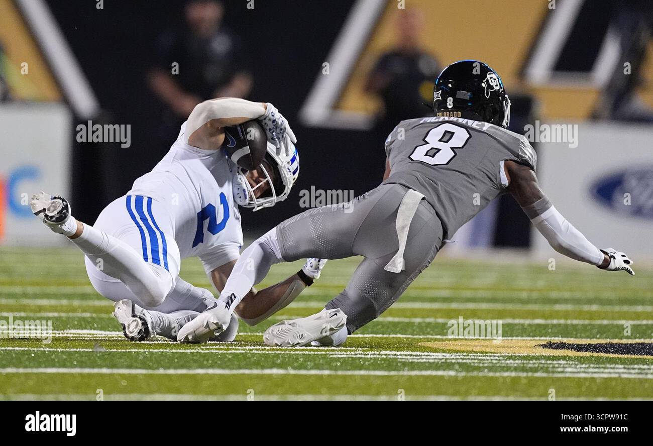 Brigham Young wide receiver Chase Roberts, back, pulls in a pass as ...