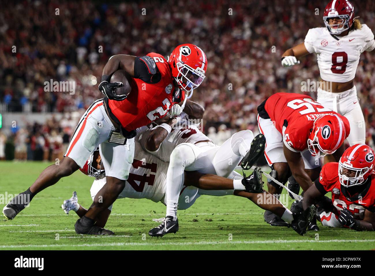 Georgia running back Josh McCray (2) fights through contact before ...