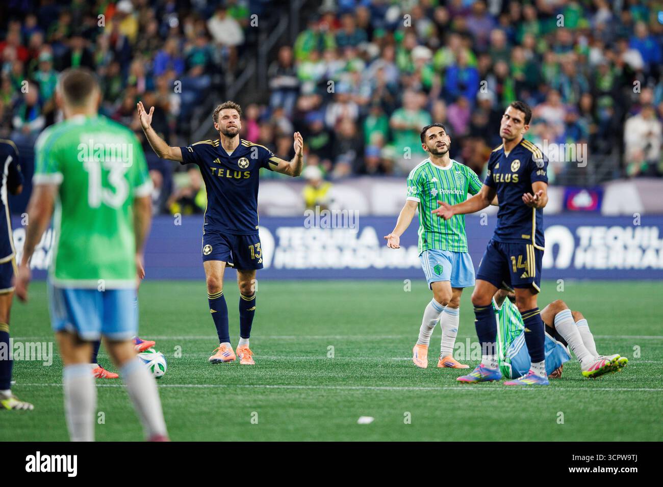 Vancouver Whitecaps FC midfielder Thomas Müller and Seattle Sounders FC ...