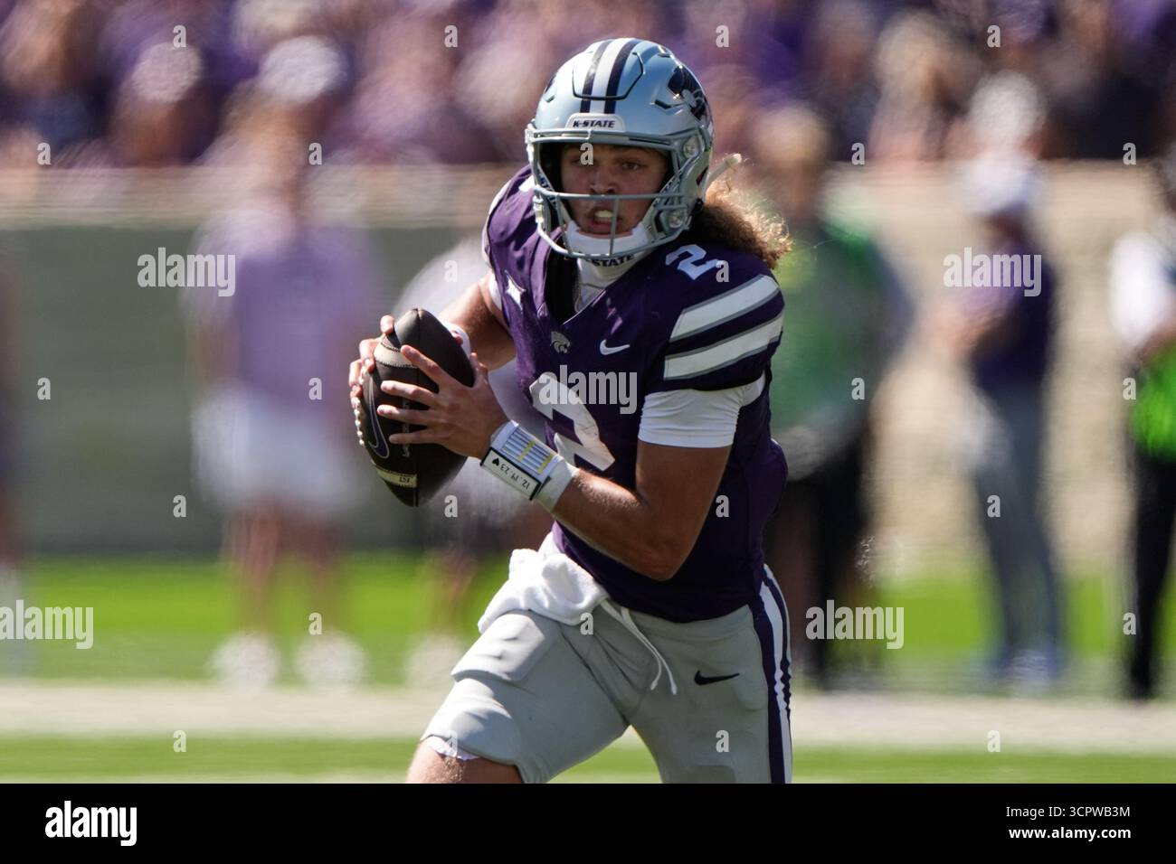 Kansas State quarterback Avery Johnson looks to pass during the first ...