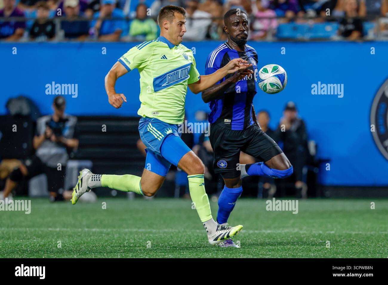 CF Montreal forward Prince Owusu, right, battles FC midfielder Andrew ...
