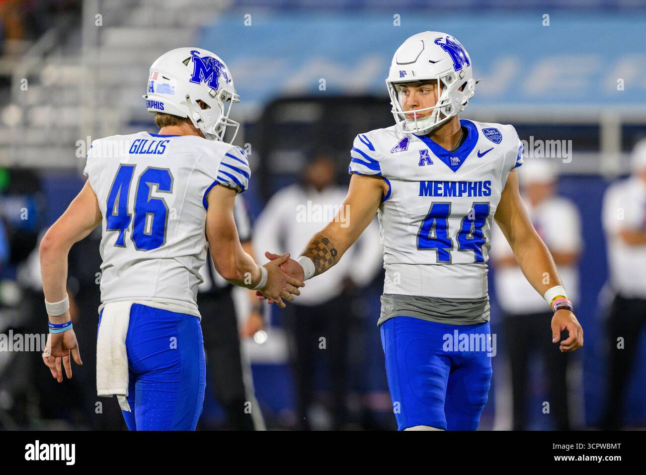 Memphis punter Tanner Gillis (46) and kicker Gianni Spetic (44 ...