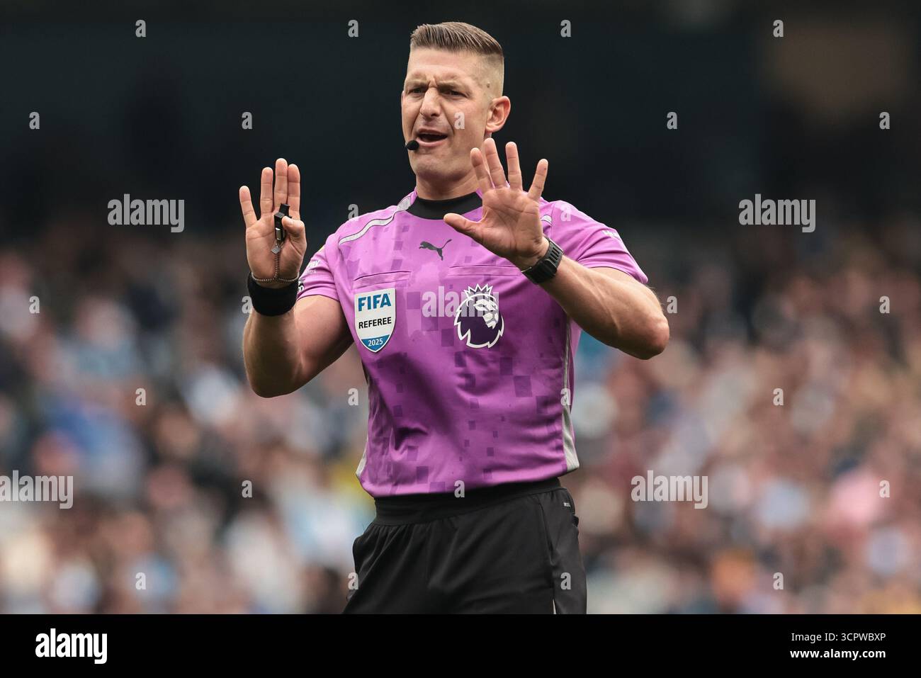 Referee Rob Jones reacts during the Premier League match Manchester ...