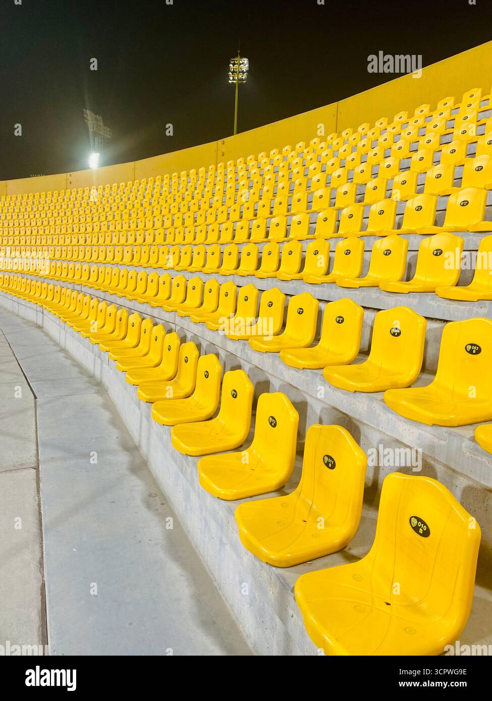 Empty seats at football stadium Stock Photo - Alamy