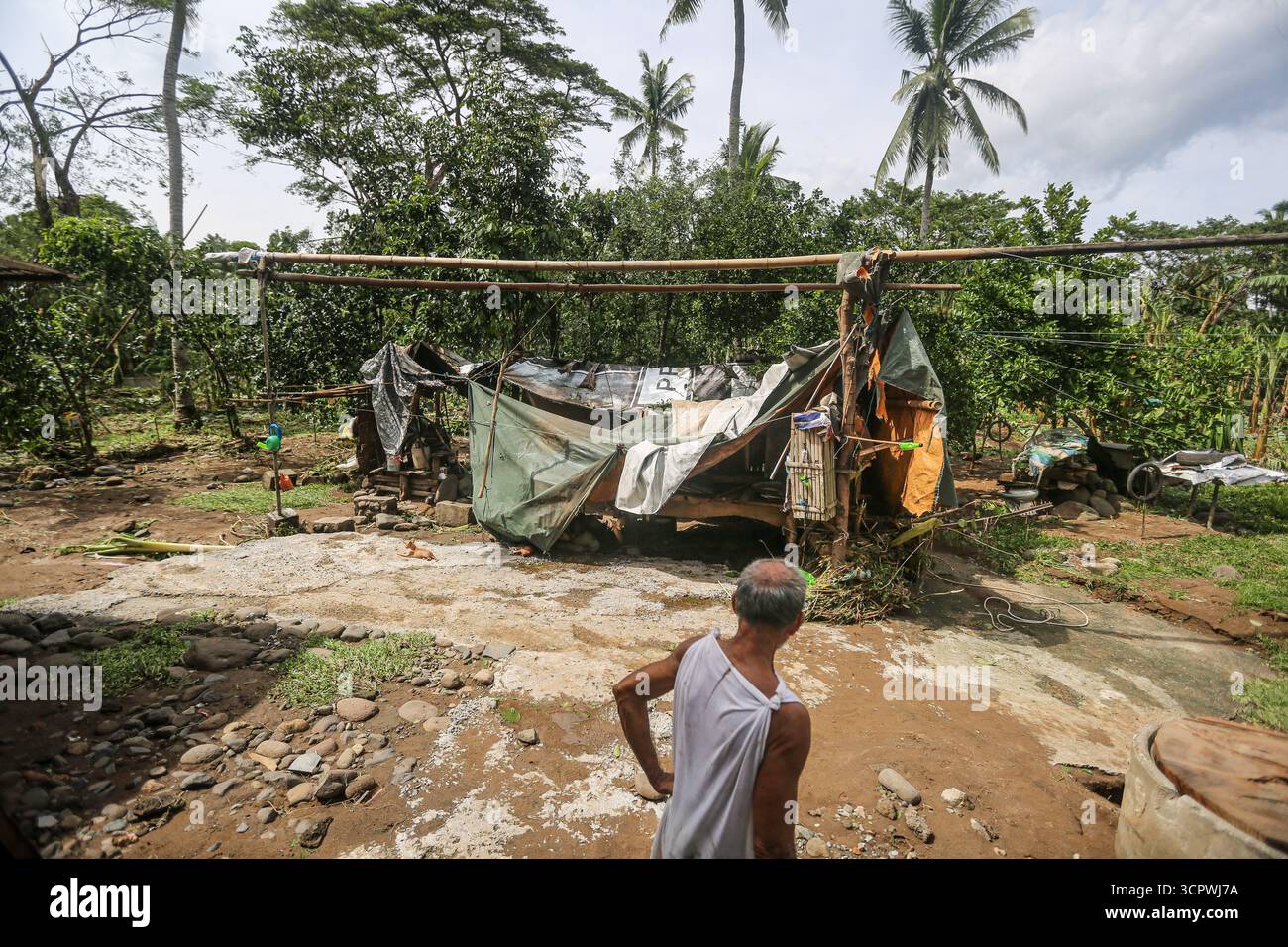 Man carried debris in hi-res stock photography and images - Alamy