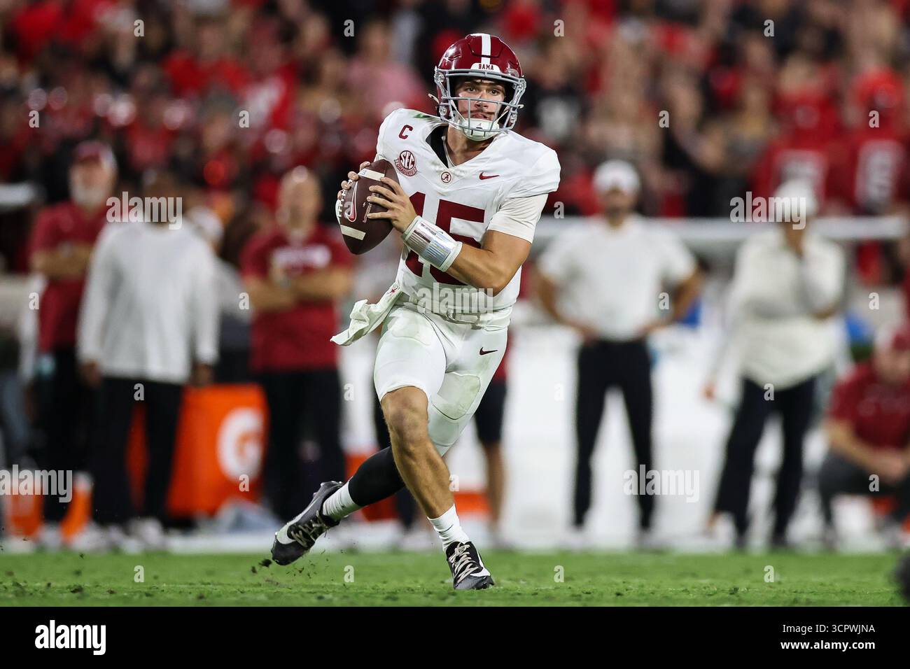 Alabama Crimson Tide quarterback Ty Simpson runs with the football ...