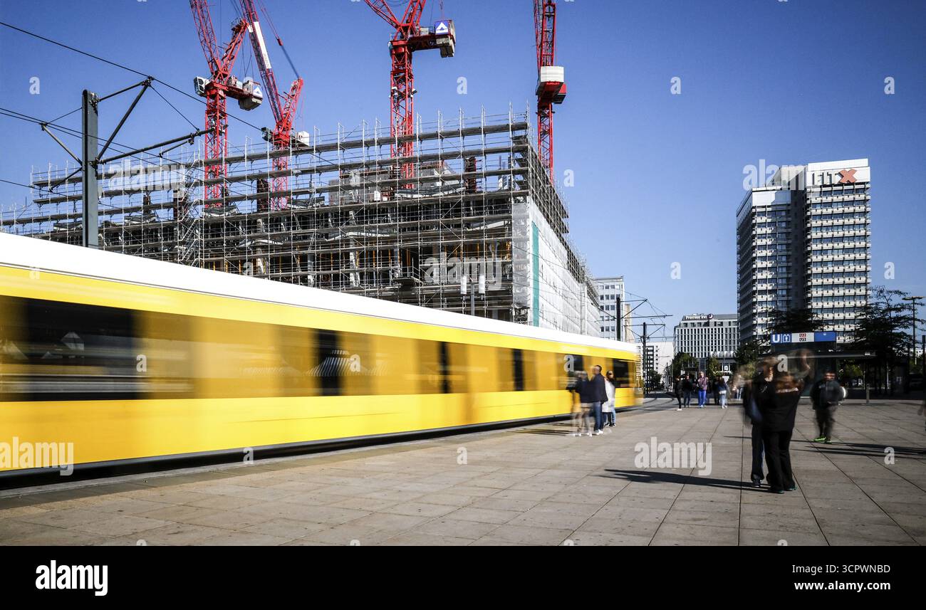 Tram at Alexanderplatz, in the background construction of a high-rise ...