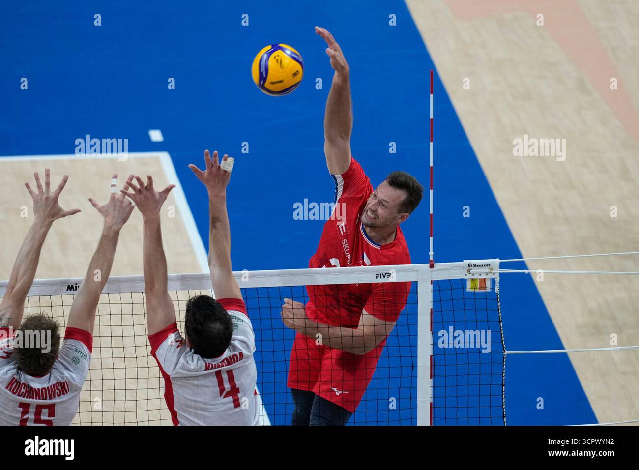 Jan Galabov of the Czech Republic spikes during the bronze medal match ...