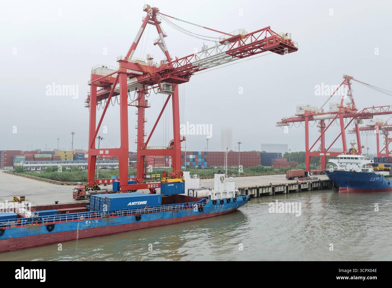 Aerial photo shows the busy container terminal at Yangzhou Port in ...