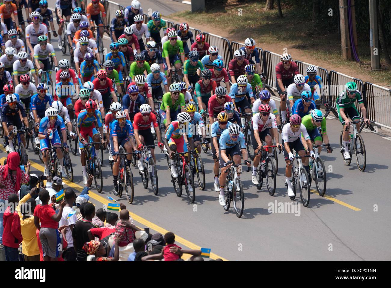 The pack pedals during the men's Elite road race, at the road cycling ...