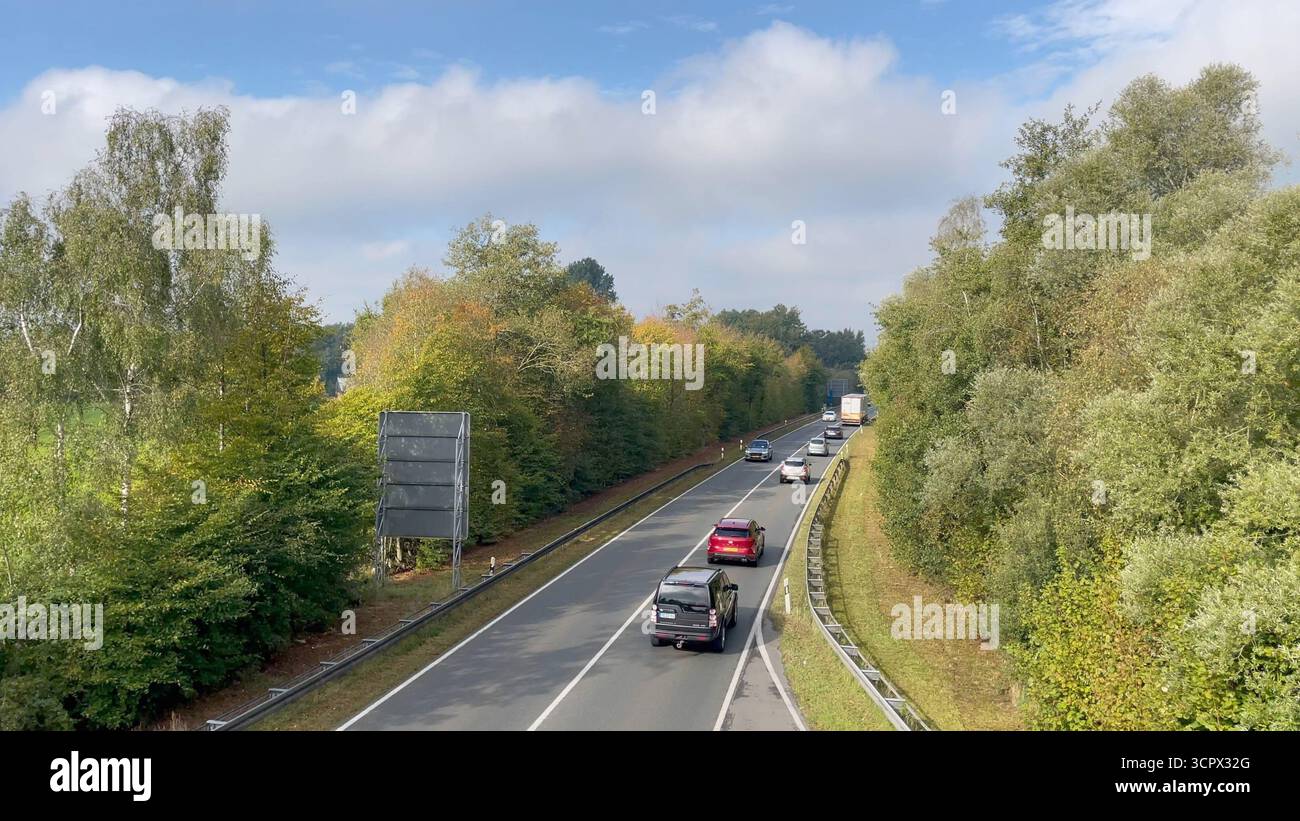 Gronau Westf. NRW Germany September 2025. Cars and trucks pass along ...