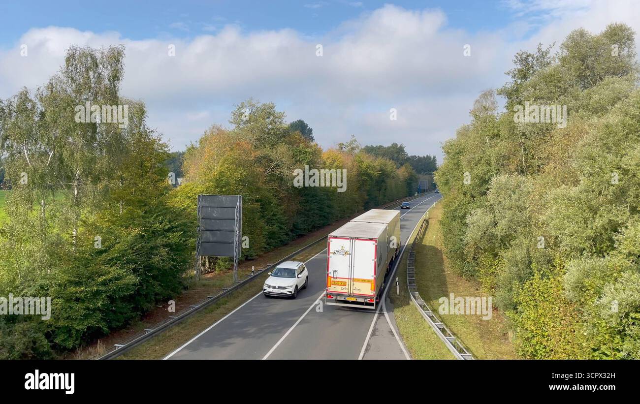 Gronau Westf. NRW Germany September 2025. Cars and trucks pass along ...