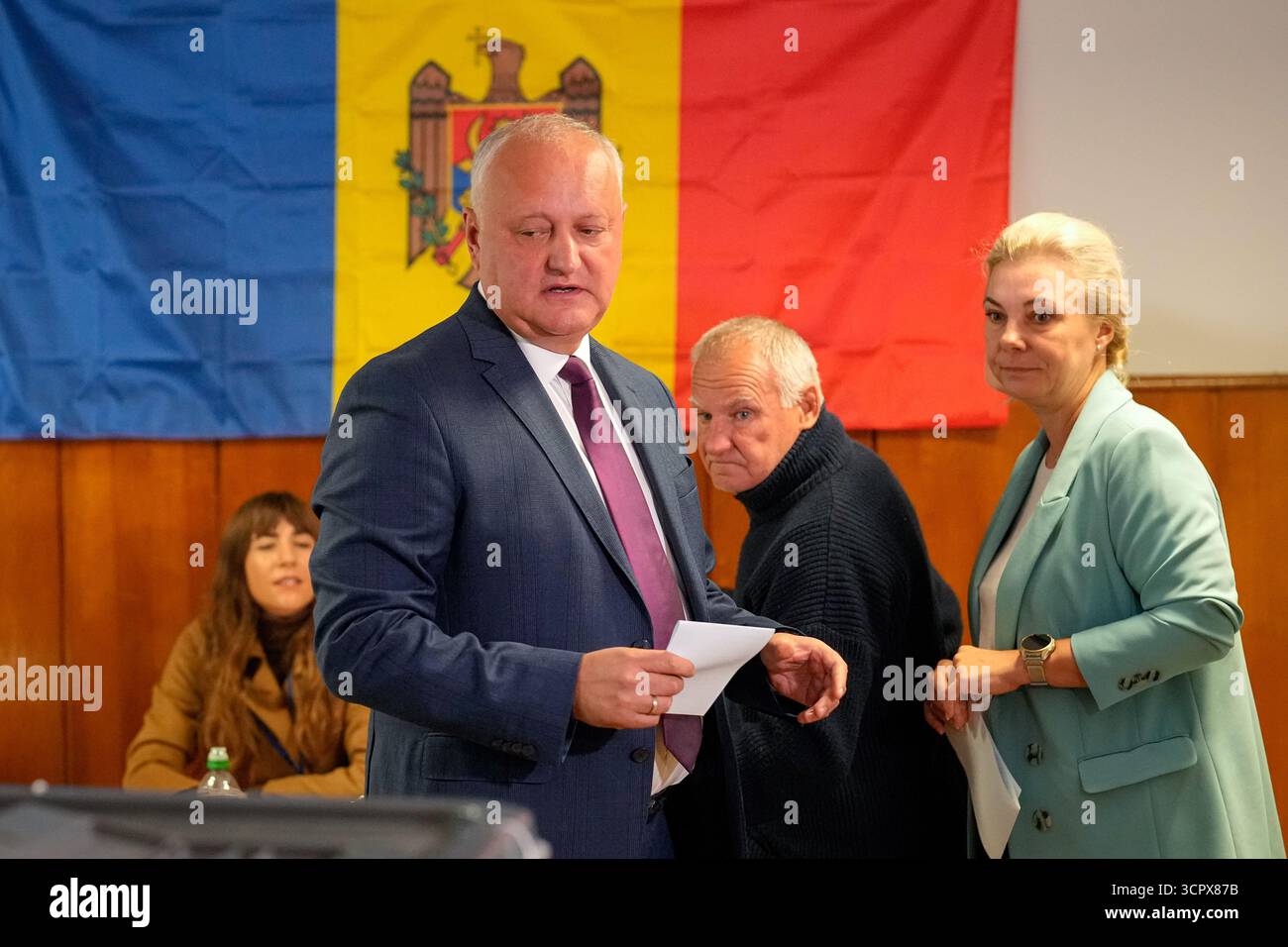 Former Moldovan President Igor Dodon, left, and his wife Galina prepare ...