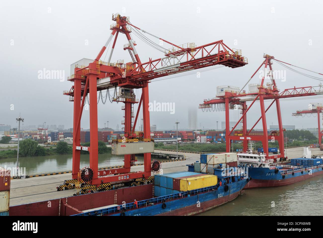 Aerial photo shows the busy container terminal at Yangzhou Port in ...