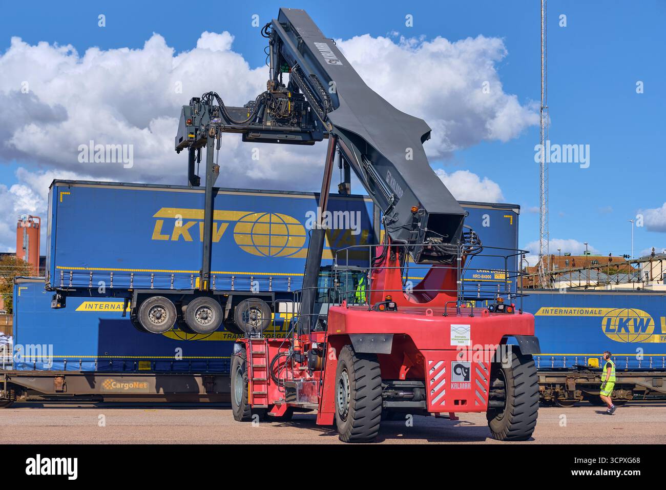 Trelleborg, Sweden ; September 23, 2025: Kalmar reachstacker loading ...