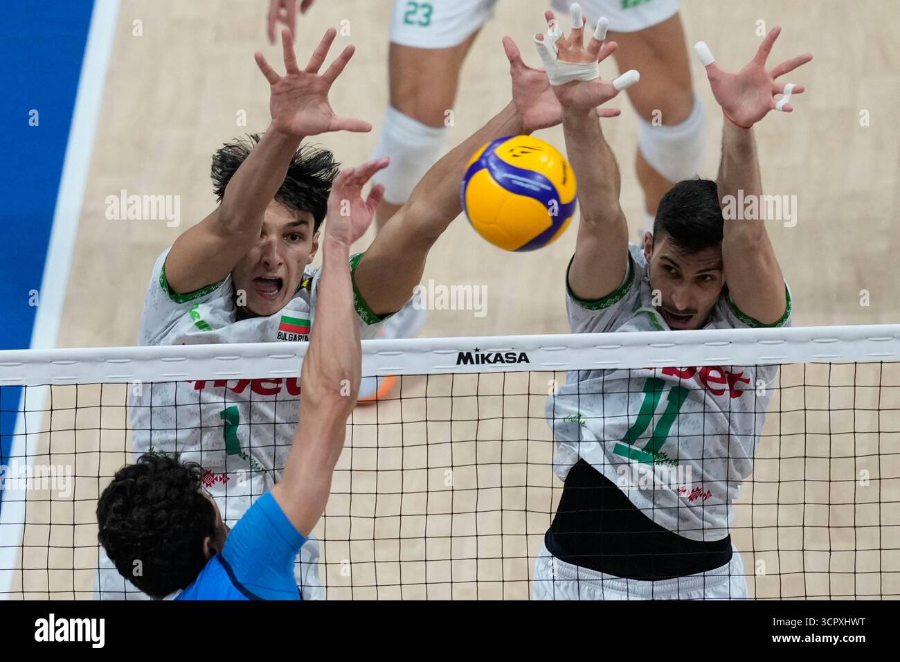 Simeon Nikolov, left, and Aleks Grozdanov of Bulgaria block a shot from ...