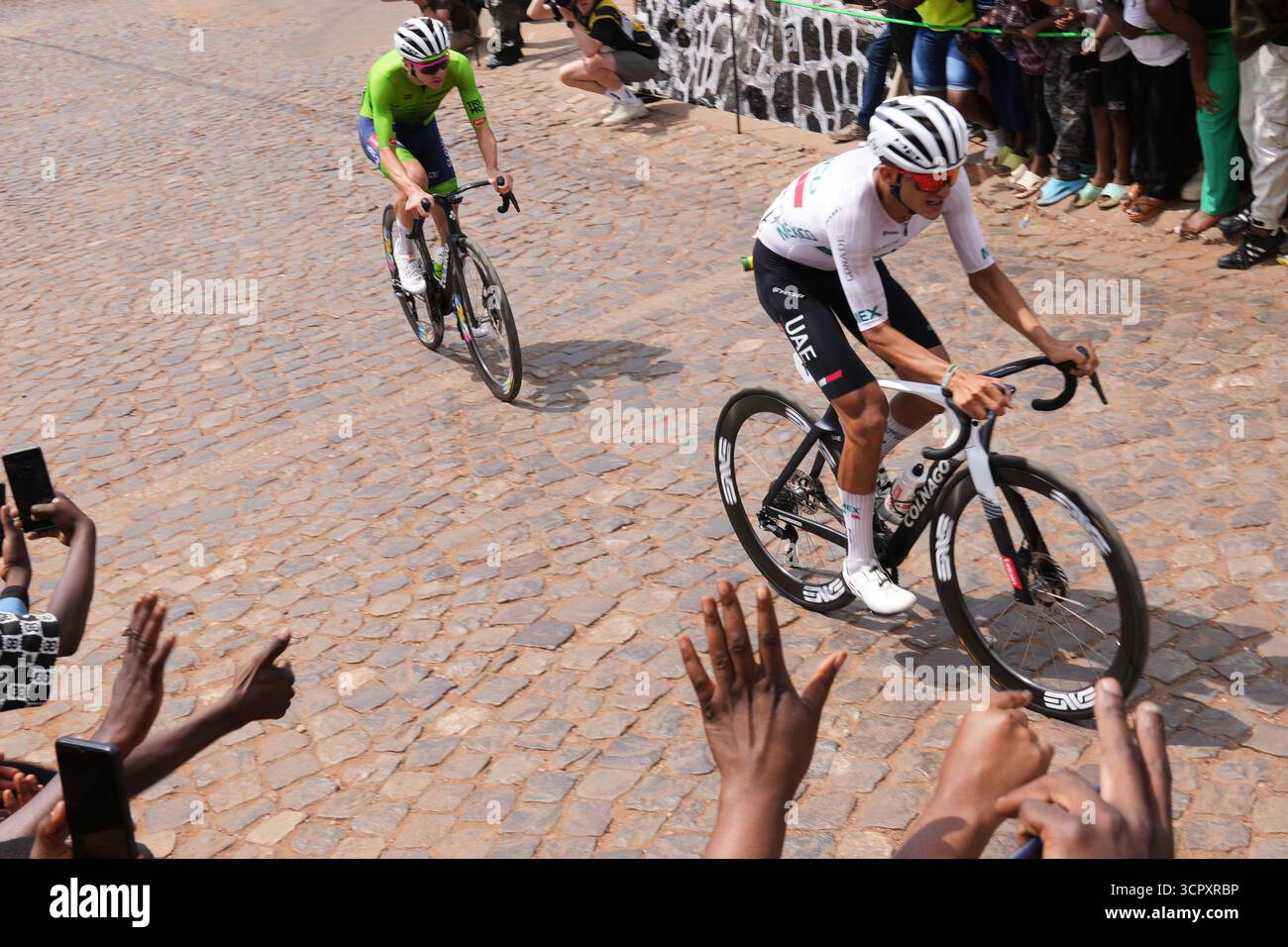 Mexico's Isaac del Toro Romero leads Slovenia's Tadej Pogacar as they ...