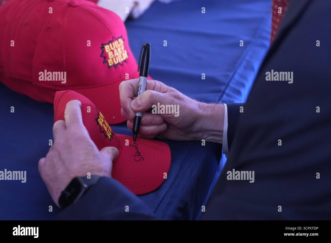 Housing Secretary Steve Reed signs a 'Build Baby Build' merchandise ...