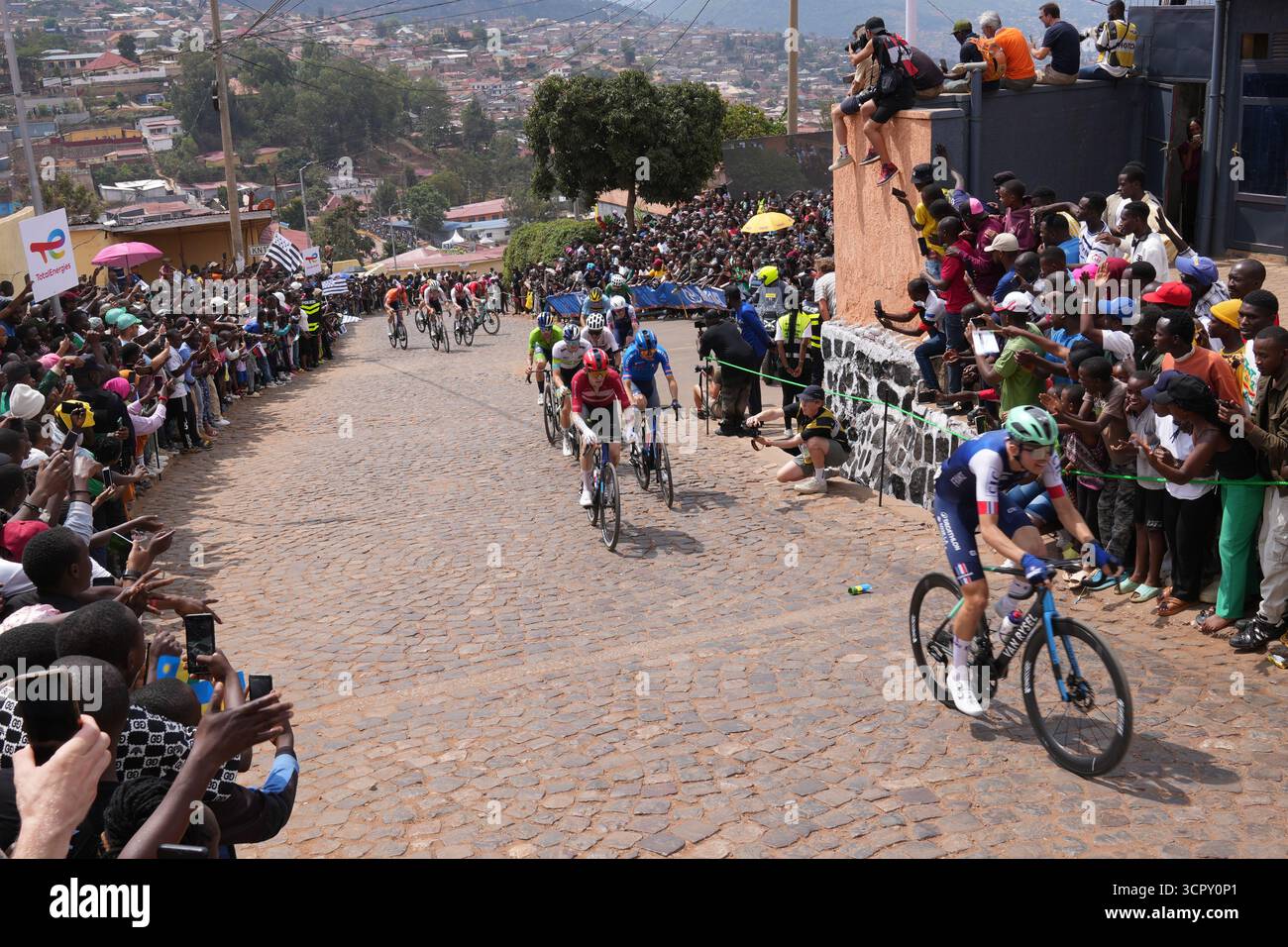Riders pedal during the men's Elite road race, at the road cycling ...