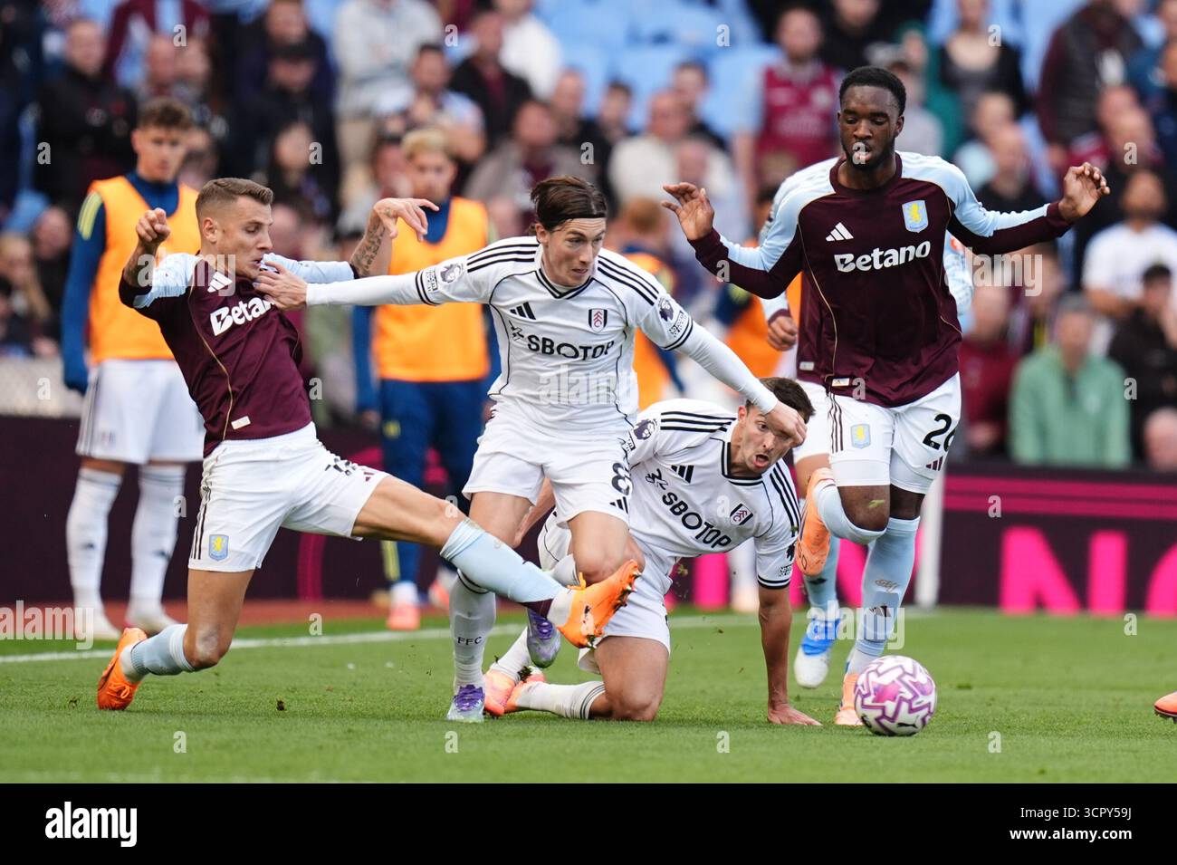 Fulham's Harry Wilson is brought down by Aston Villa's Lucas Digne ...