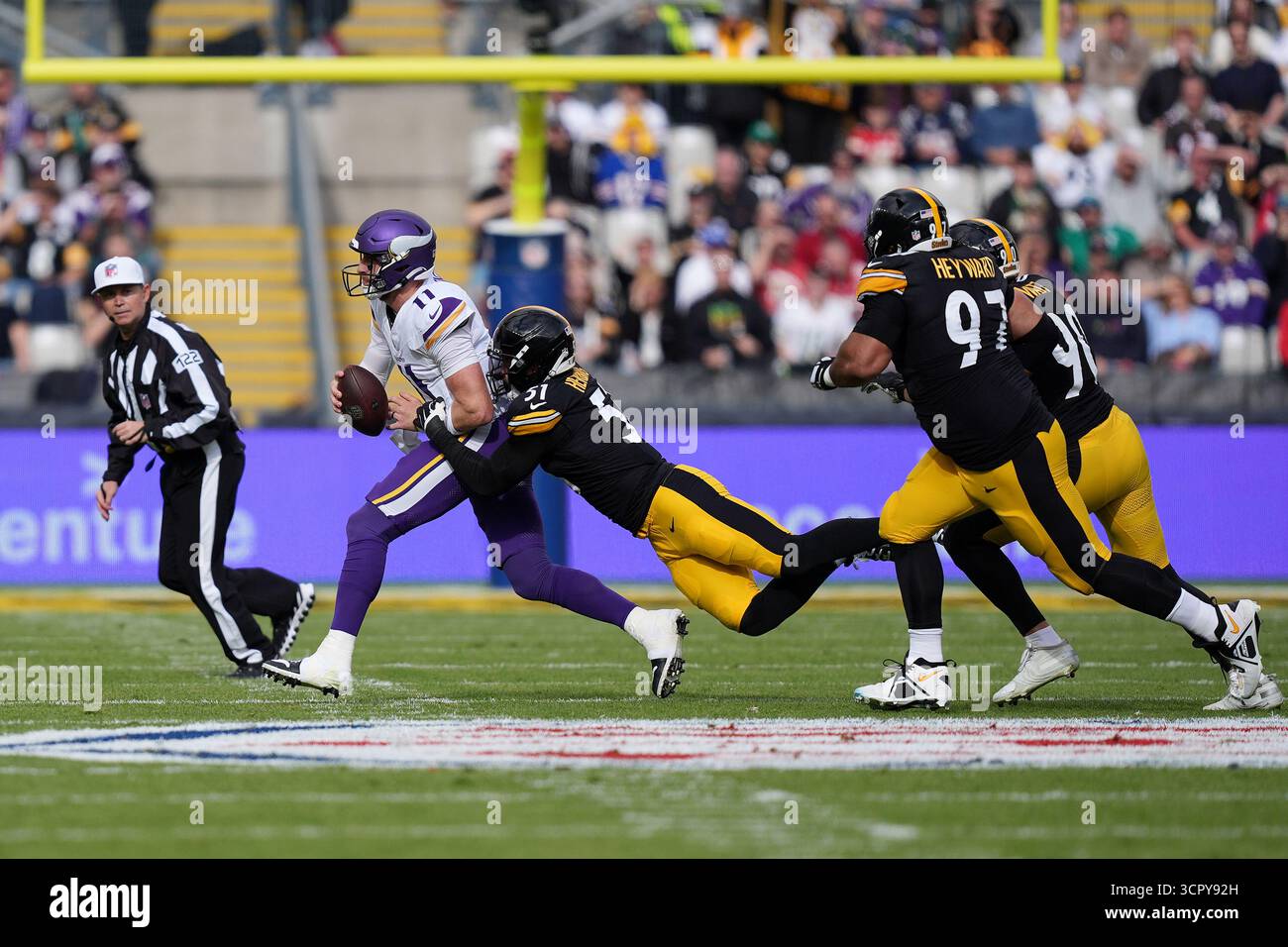 Minnesota Vikings' Carson Wentz (left) is tackled by Pittsburgh ...