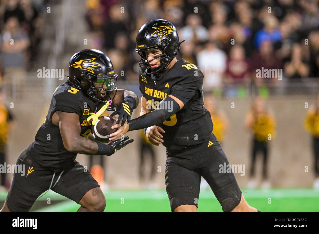 Arizona State Sun Devils quarterback Sam Leavitt (10) hands off to ...