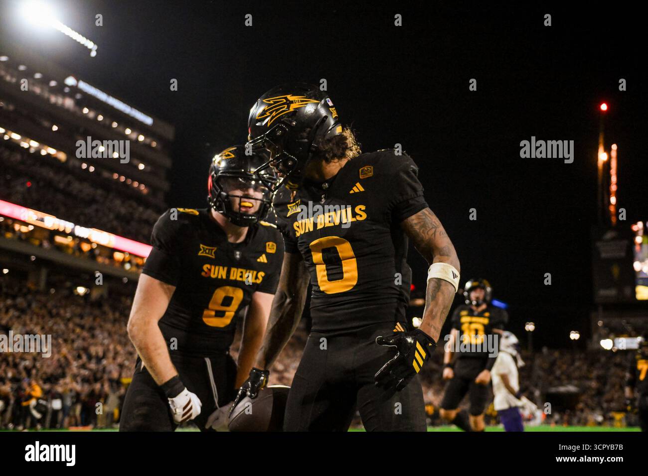 Arizona State Sun Devils wide receiver Jordyn Tyson (0) scores a ...