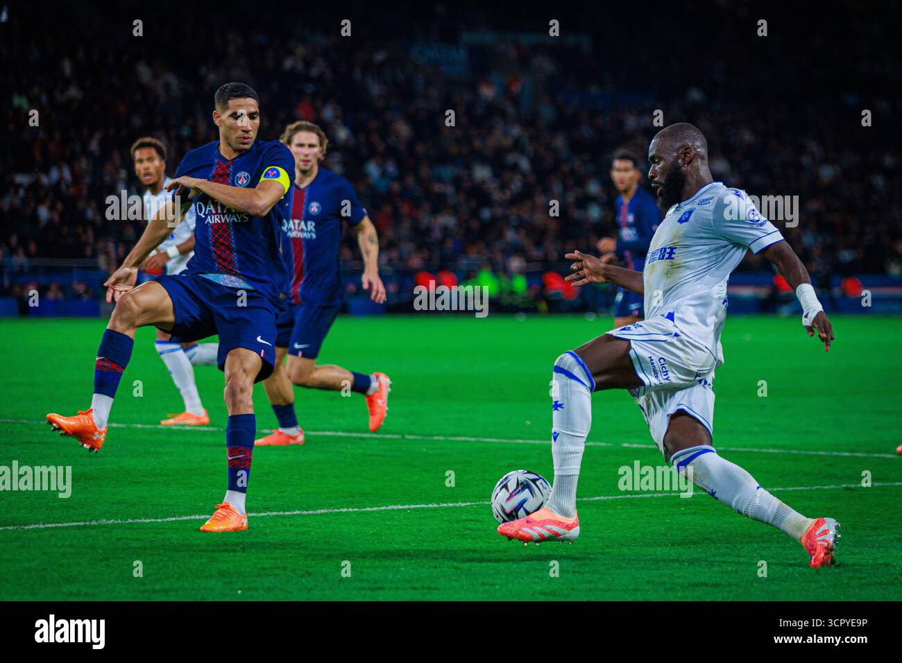 Daniel SINAYOKO of AJ AUXERRE and Achraf HAKIMI of PSG during the ...