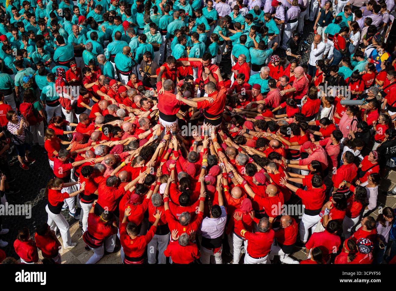 Dozens of people during the 'Castellers' day of the La Mercè festival ...