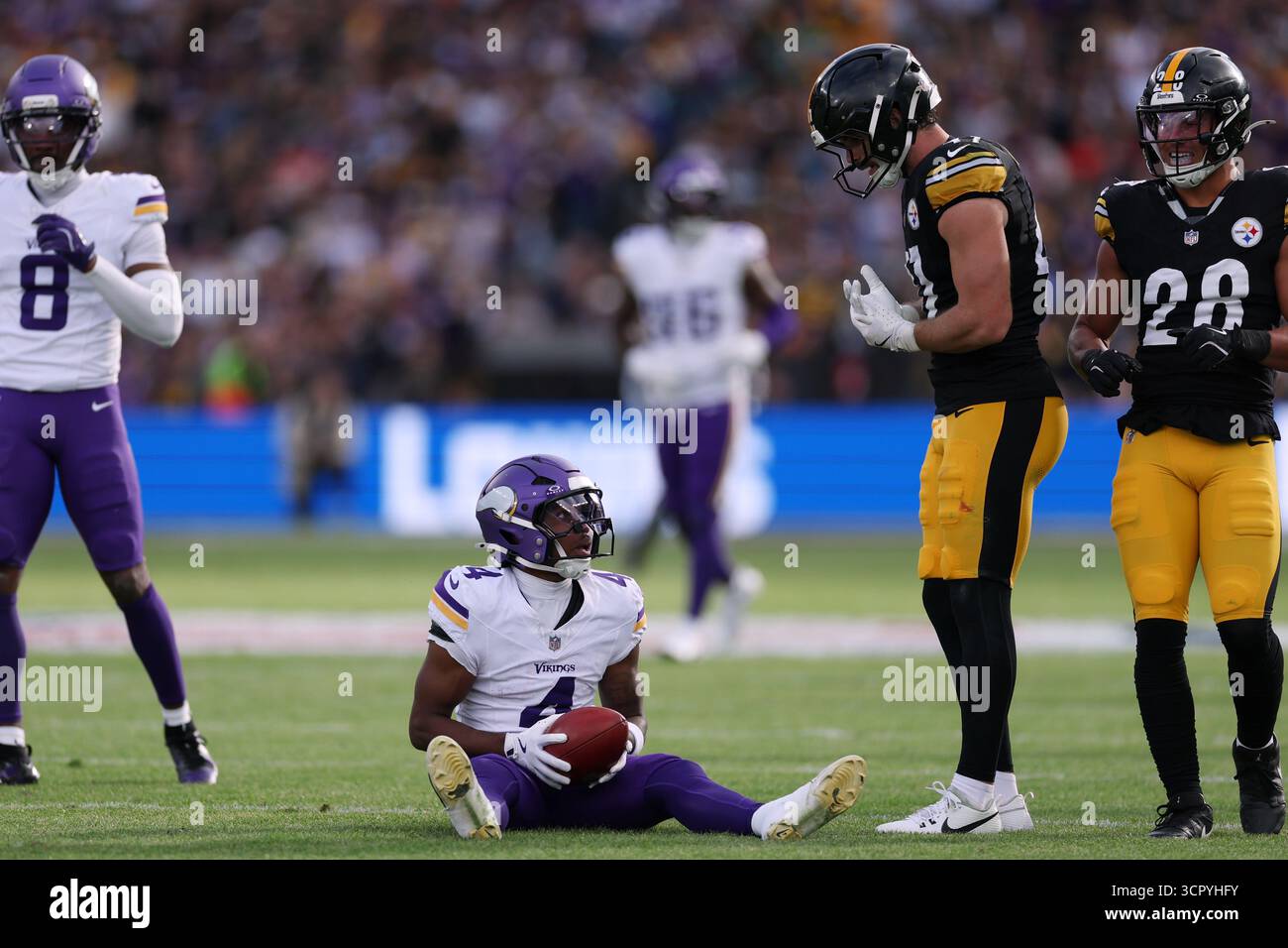Minnesota Vikings wide receiver Myles Price (4) keeps the ball a he ...