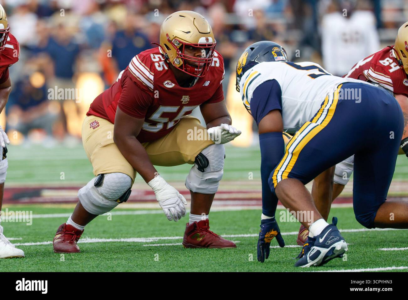 Boston College offensive lineman Robert Smith IV (55) prepares to block ...