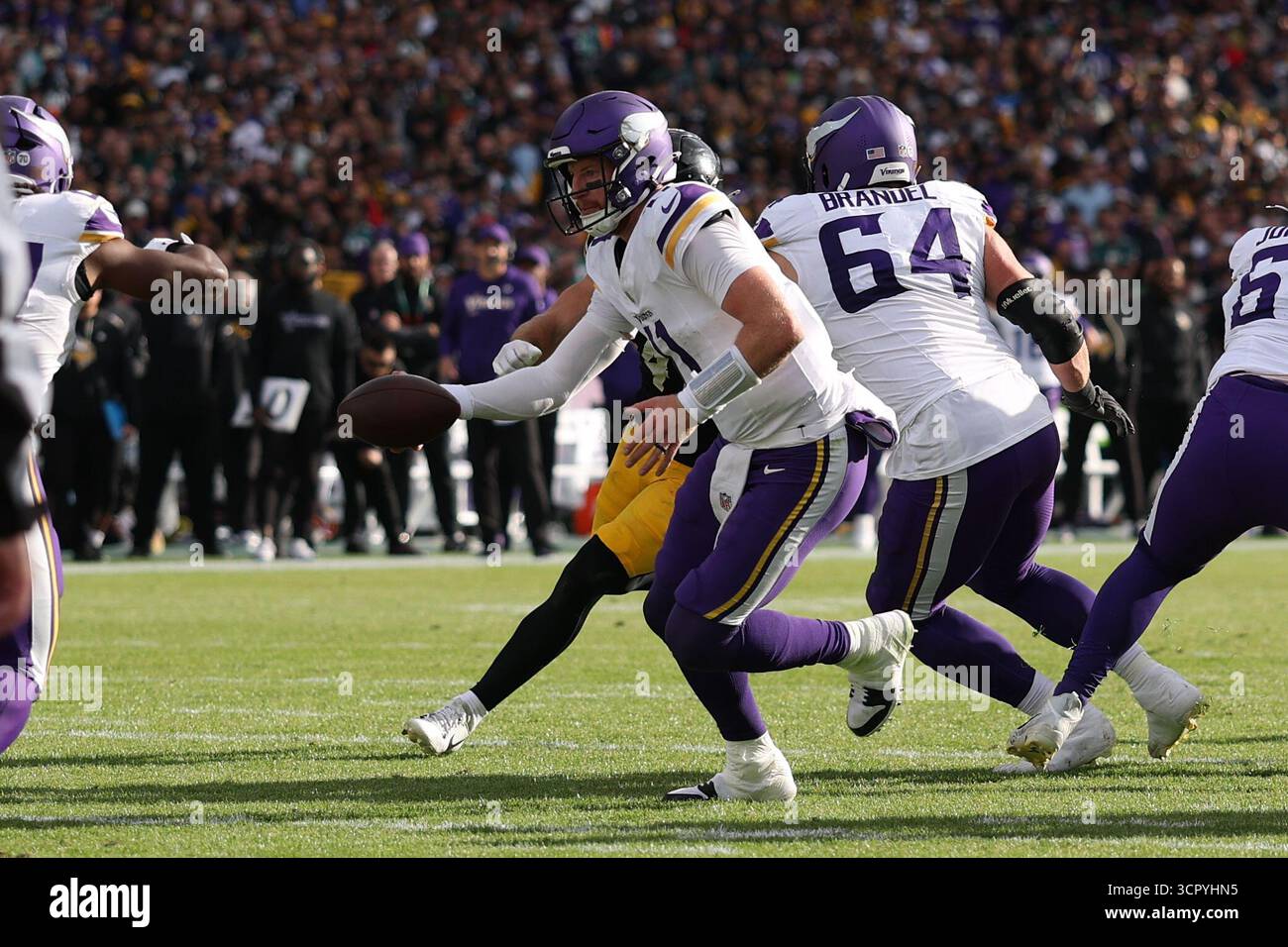 Minnesota Vikings quarterback Carson Wentz (11) passes the ball during the NFL football game ...
