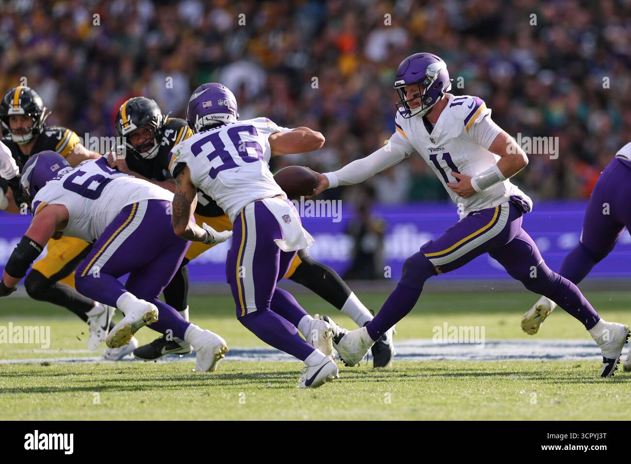 Minnesota Vikings quarterback Carson Wentz (11) passes the ball during ...