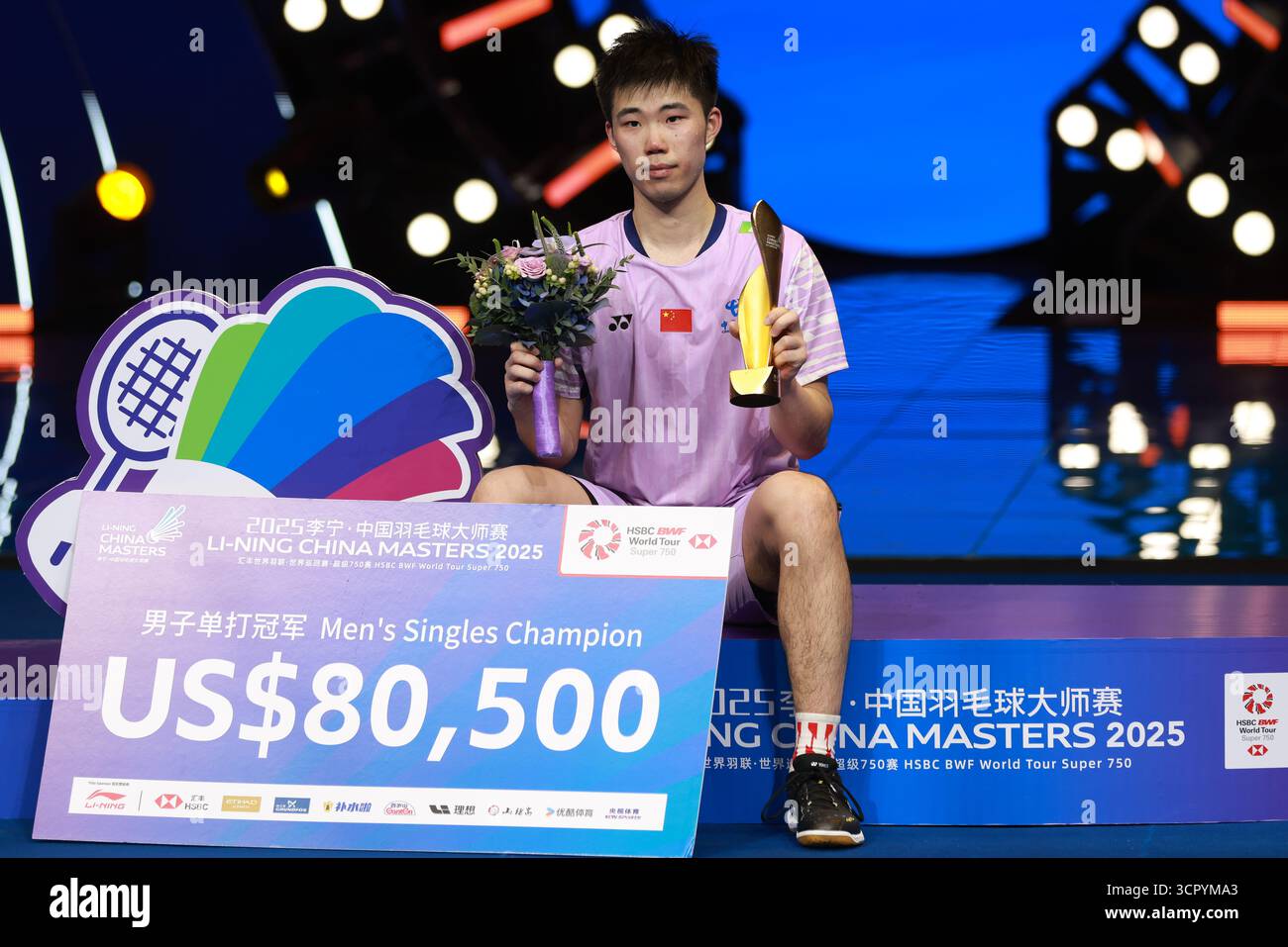 WENG Hong Yang of China celebrates on the podium with he trophy in LI ...