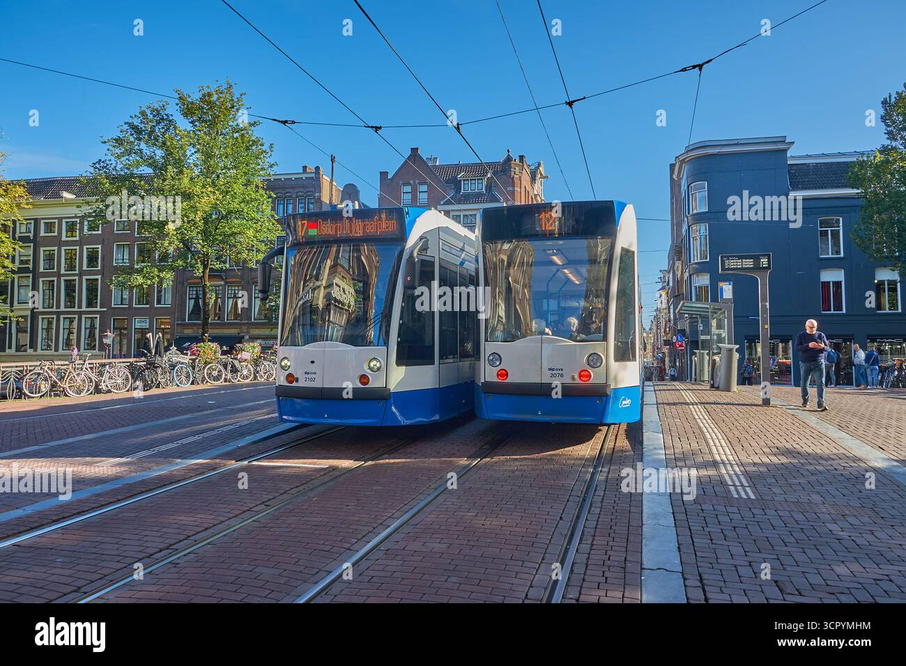 Trams in the centre of Amsterdam, Netherlands Stock Photo - Alamy