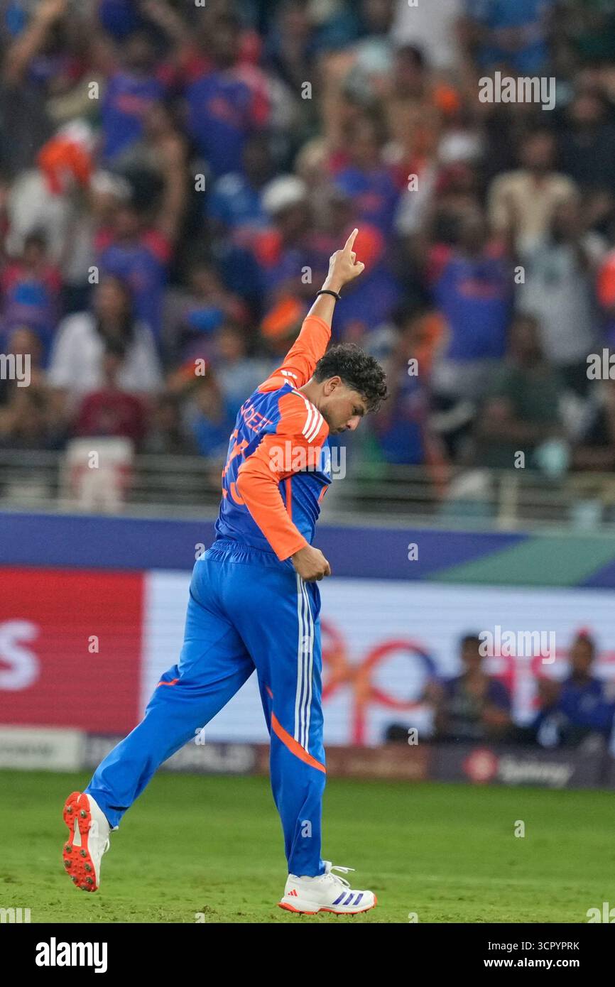 India's Kuldeep Yadav celebrates the wicket of Pakistan's Faheem Ashraf ...