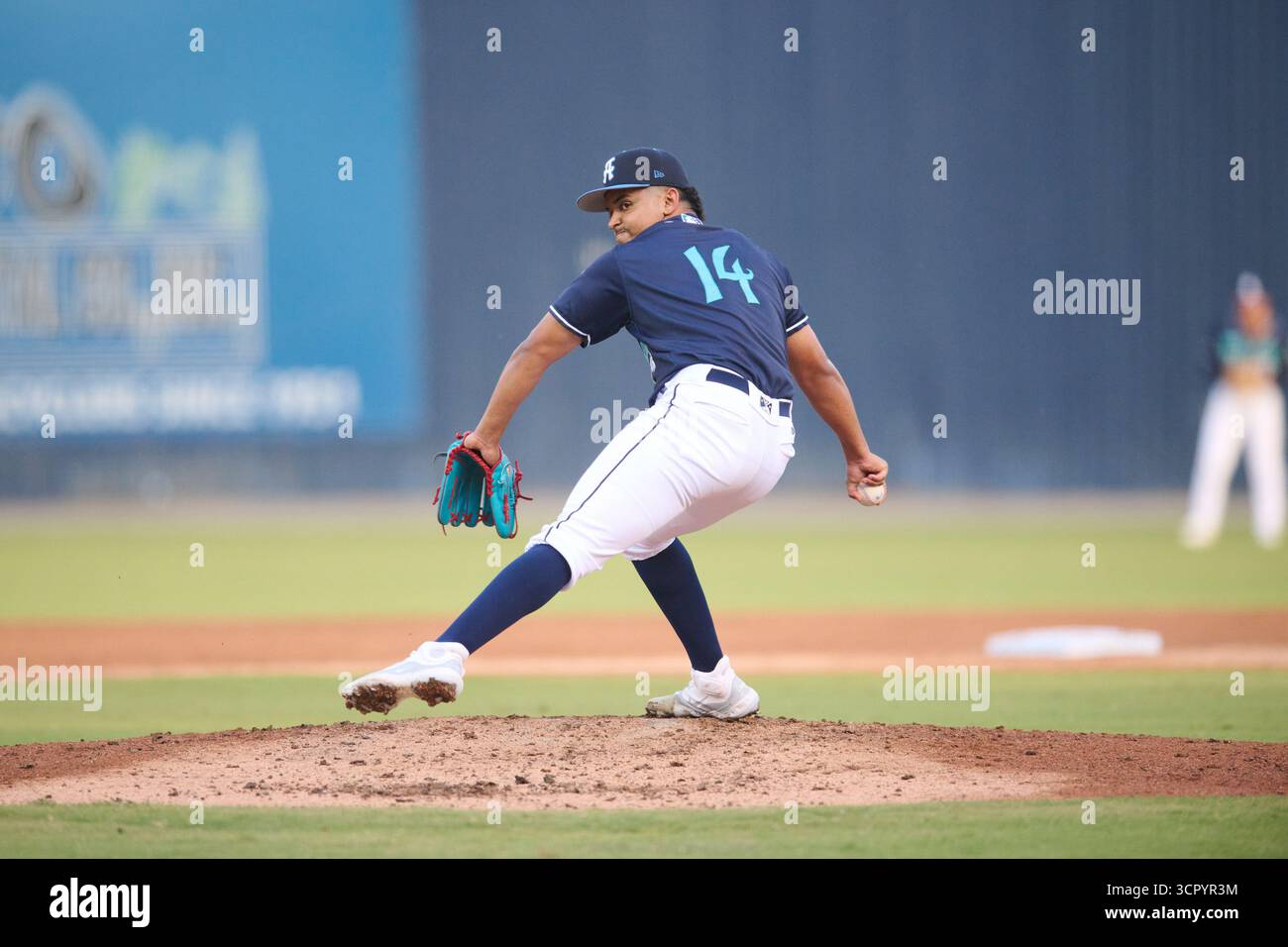 Asheville Tourists starting pitcher Anthony Cruz (14) delivers a pitch ...