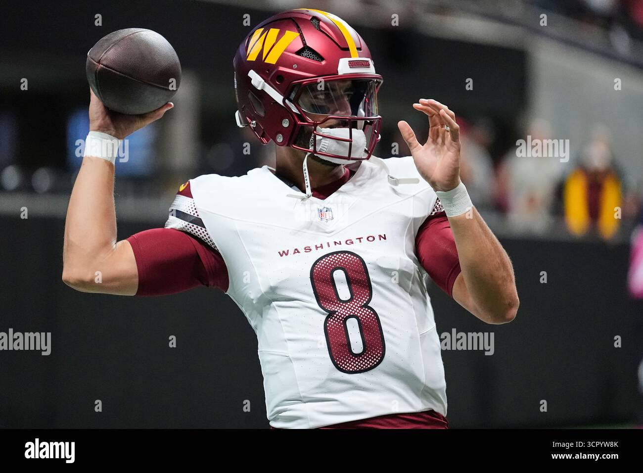 Washington Commanders quarterback Marcus Mariota (8) warms up before an ...