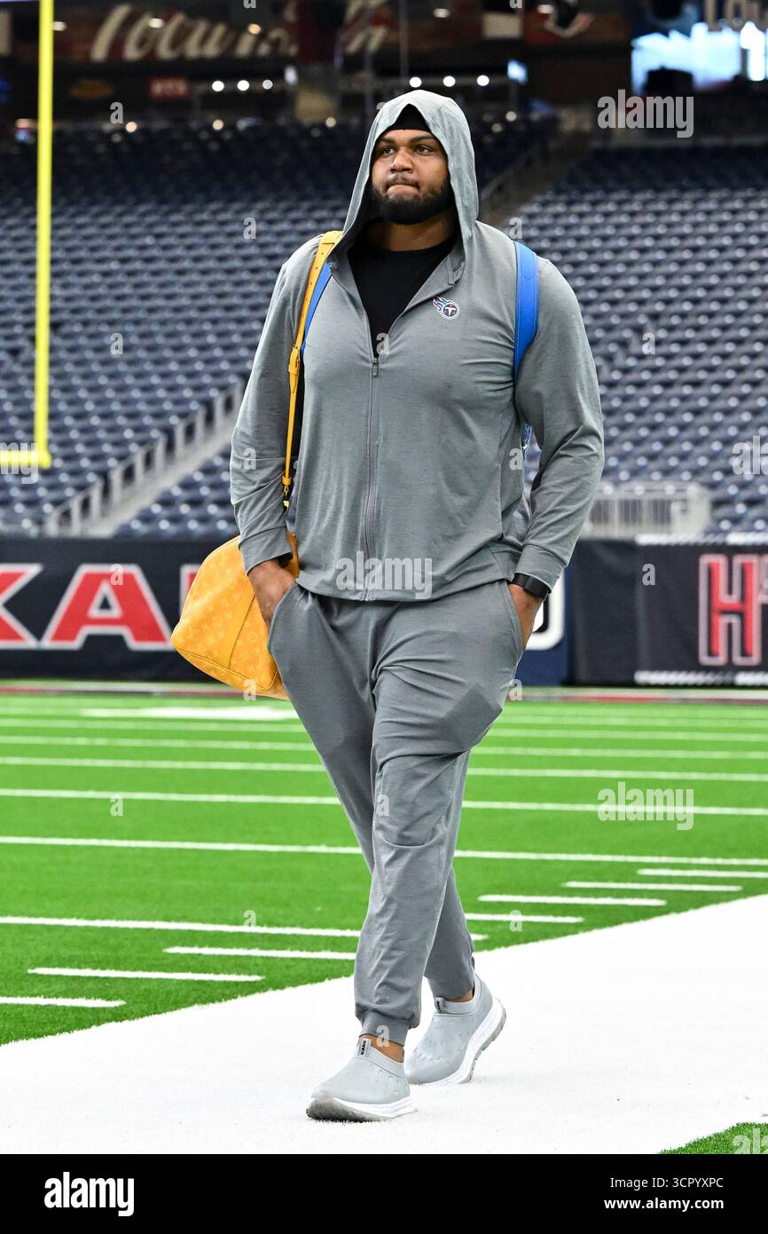 Tennessee Titans offensive tackle Dan Moore Jr. arrives prior to the ...