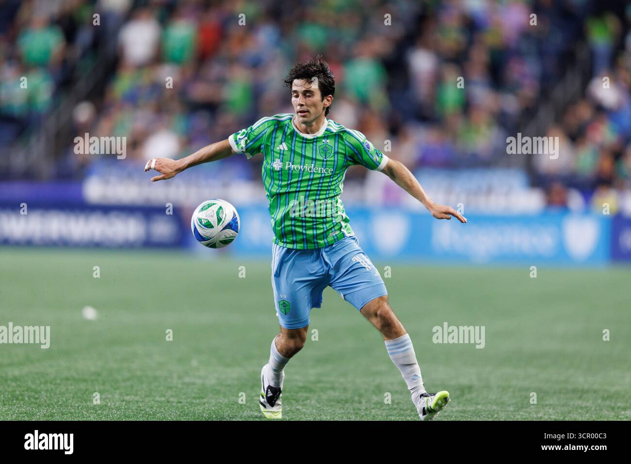 Seattle Sounders FC forward Paul Rothrock (14 tracks the ball during an ...