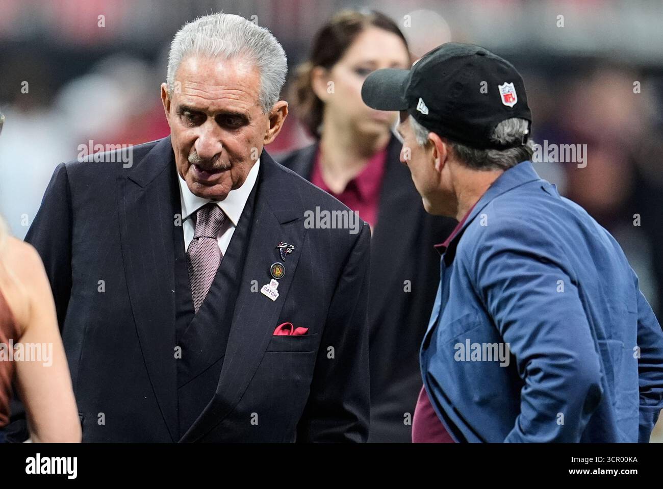 Washington Commanders owner Josh Harris, right, talks with Atlanta ...