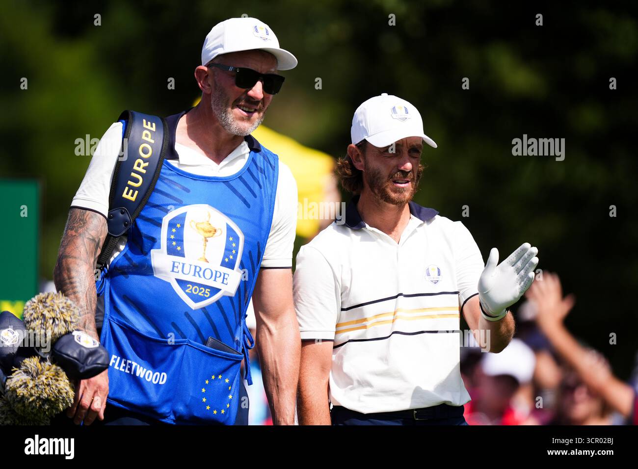 Tommy Fleetwood of Team Europe with caddie Ian Finnis during the Sunday ...