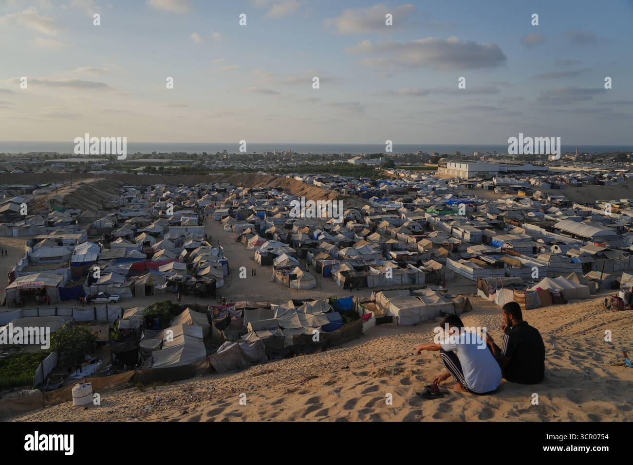 A tent camp for displaced Palestinians stretches along the Muwasi, an ...